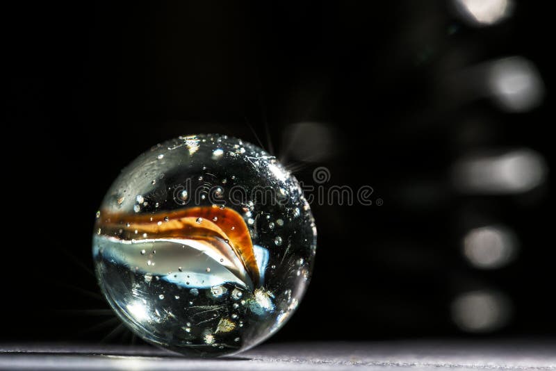 Glass marble macro a stock image. Image of clipping, games - 73543535