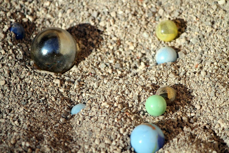 Play marbles 1 stock image. Image of stones, glass, summer - 2536549