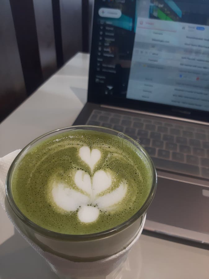 A glass of matcha latte stock image. Image of matcha - 263807015