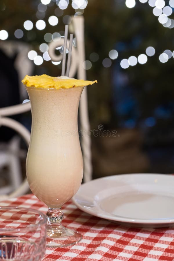 Glass of a Milkshake is on a Table in an Italian Restaurant, Close Up ...