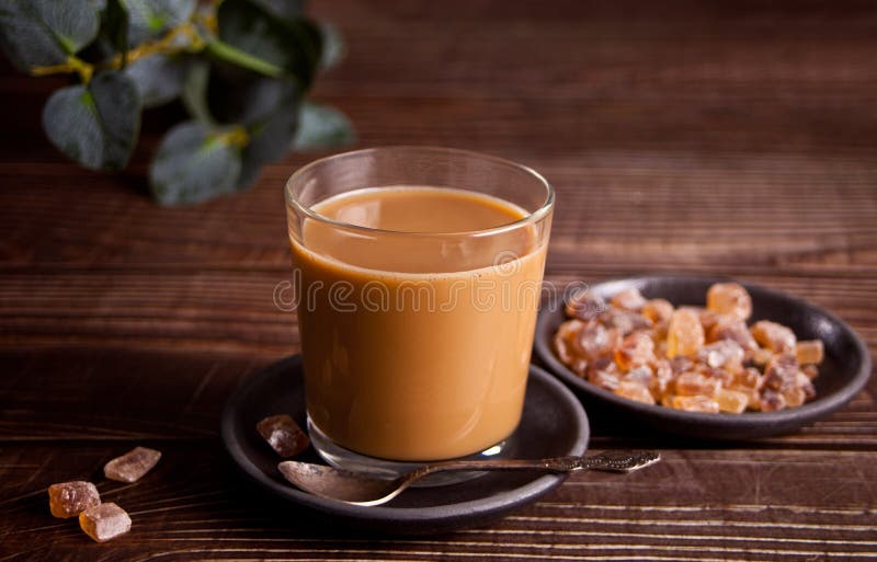 Glass of Milky Coffee with Rock Candy Sugar. Stock Image - Image of ...