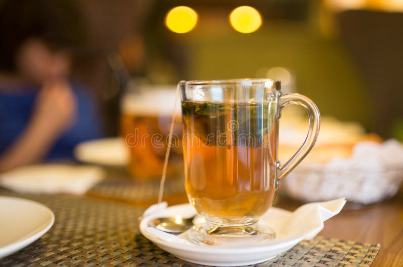 A Glass of Mint Tea in a Restaurant Stock Photo - Image of spoon ...