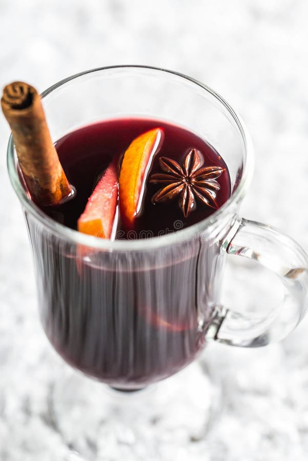 Glass of Mulled Wine in Snow Stock Photo - Image of light, german: 62761436