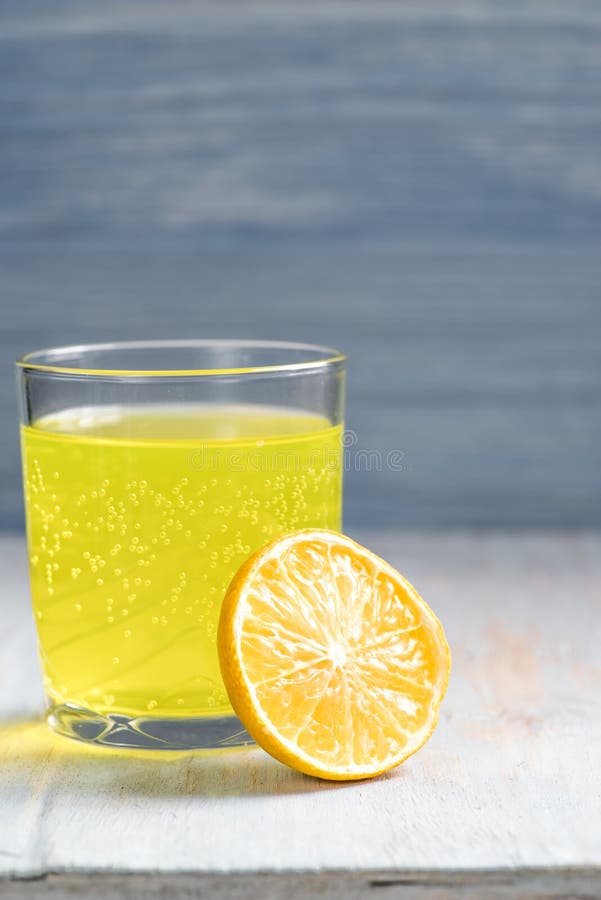 Glass of Multifruit Juice on Wooden Table Stock Photo - Image of heat ...