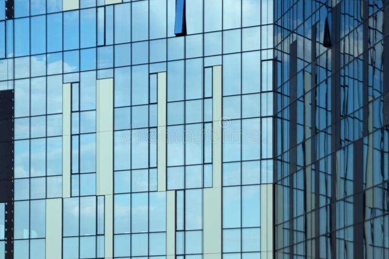 Glass Office Building, View of the Sky Reflected in the Windows ...