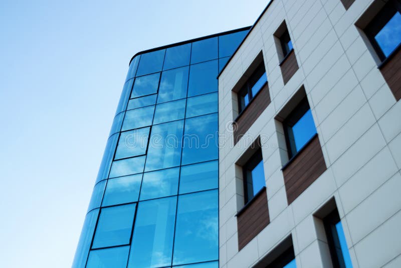 Glass Office Building, View of the Sky Reflected in the Windows ...