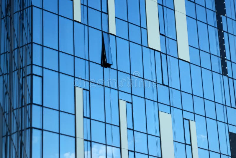 Glass Office Building, View of the Sky Reflected in the Windows ...