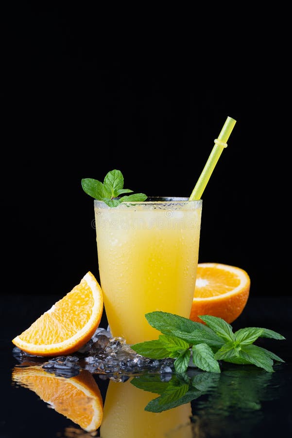 A Glass of Orange Juice on a Black Background Stock Photo - Image of ...
