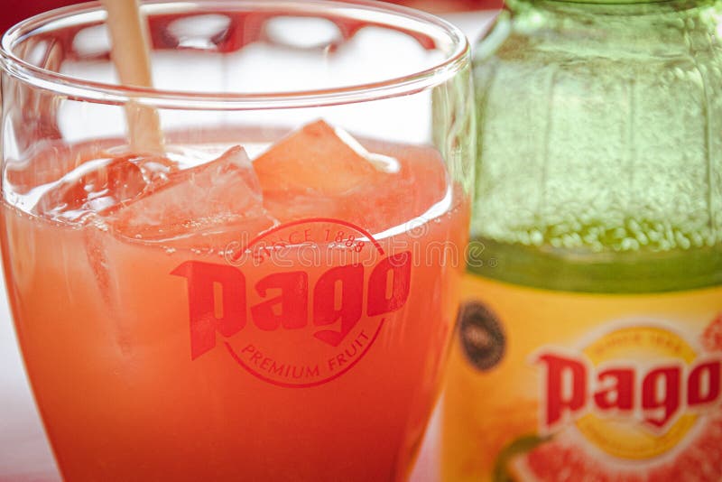 Glass of Pago Brand Fruit Juice Editorial Image - Image of closeup ...