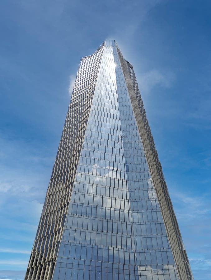 Glass-paneled Office Building. the Glass is Blue. Sky Background Stock ...