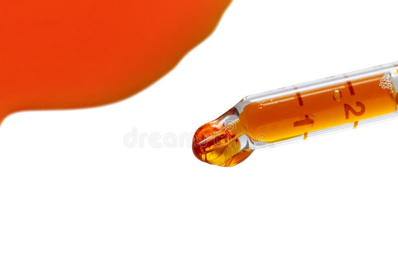 Glass Pipette with Orange Vegetable Oil. Isolate on White Stock Photo ...