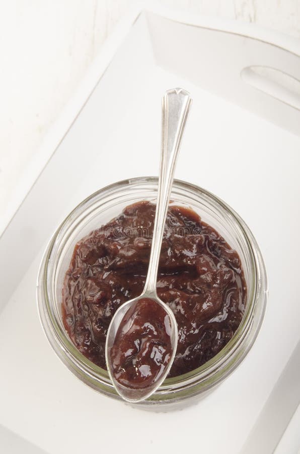 Glass with Plum Jam and a Small Spoon Stock Photo - Image of serving ...