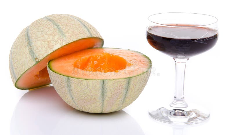 Glass of Porto Wine with a Melon Cut in Half Stock Photo - Image of ...