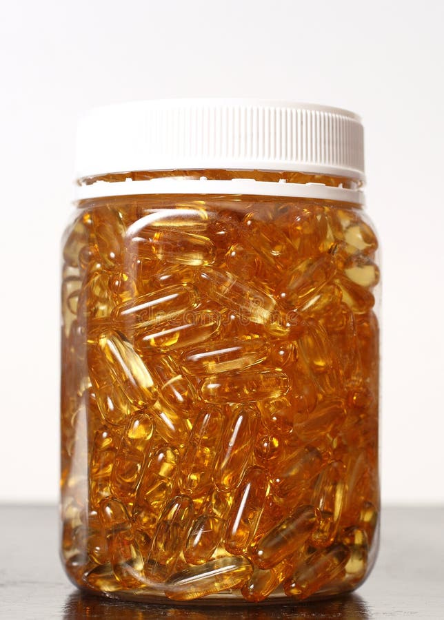 Glass Pot With Gold Boluses Stock Photo - Image of antibiotic, isolated ...