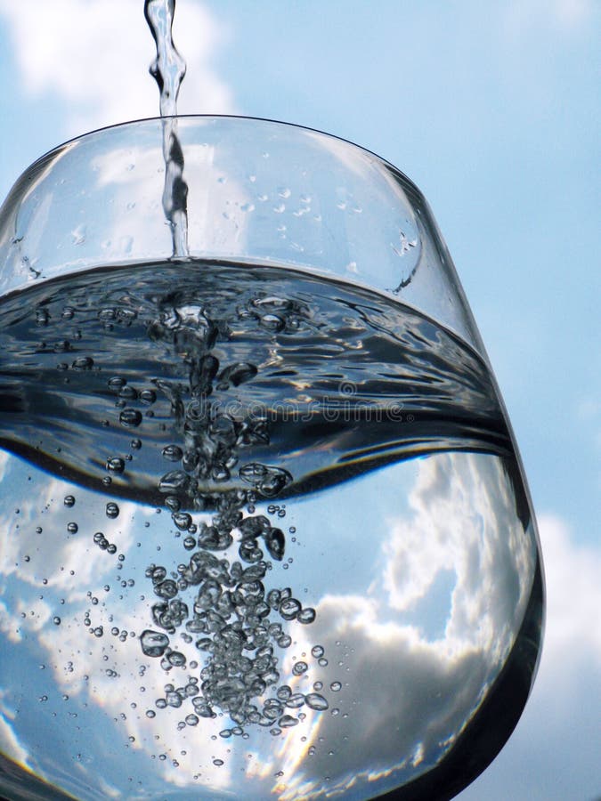 Glass of Pouring Water with Reflection Stock Photo - Image of clouds ...
