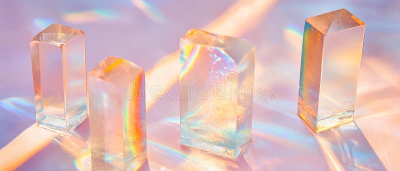 Glass Prisms Displaying Vibrant Rainbow Refractions on a Smooth Surface ...