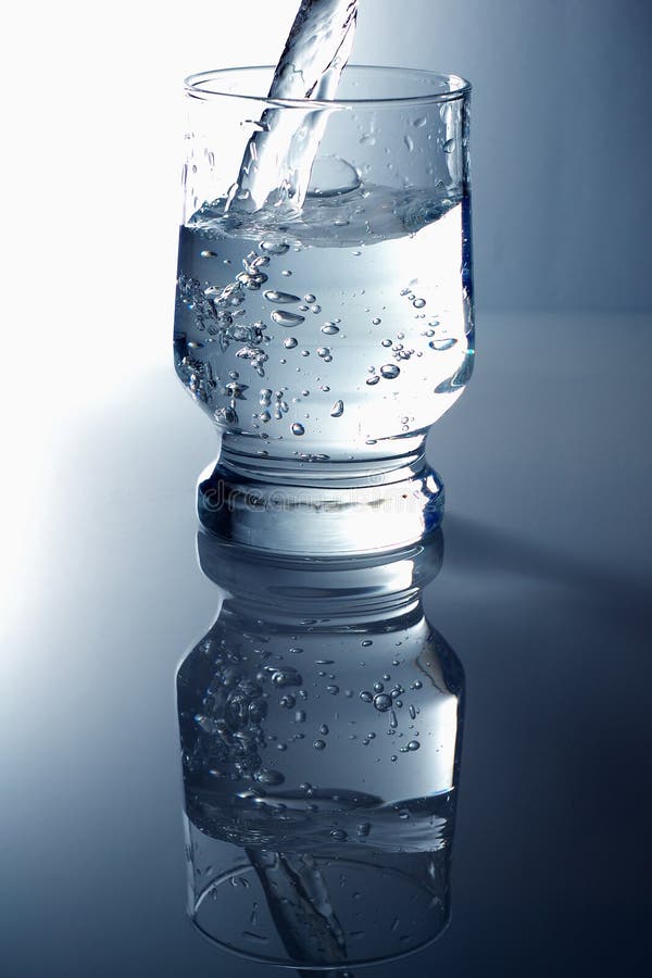 Glass with pure water stock image. Image of reflection - 1494449