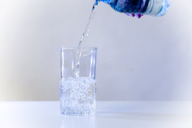 Glass of Pure Water on a White Kitchen Table Stock Photo - Image of ...