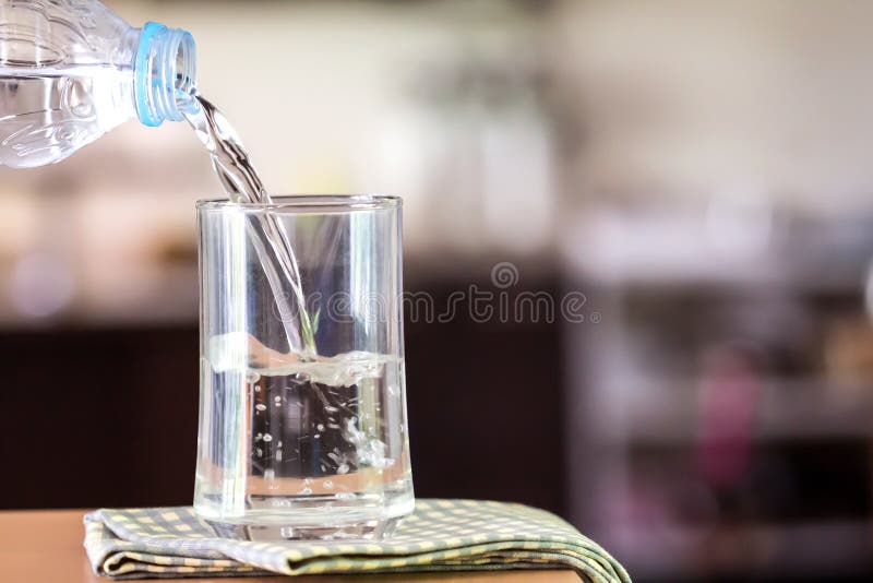 The Glass of the Purified Water on the Table Bar in Kitchenroom Stock ...