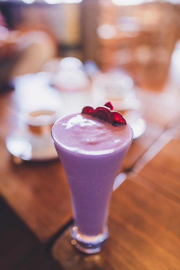 A Glass of Purple Milkshake Stock Photo - Image of glow, next: 255555274