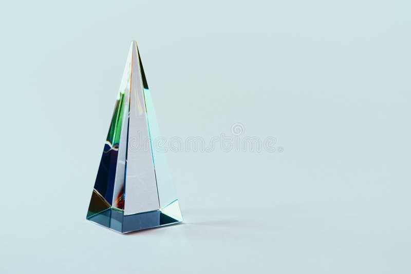 Glass Pyramid Prism on Pastel Light Background with Colorful Sunlight ...