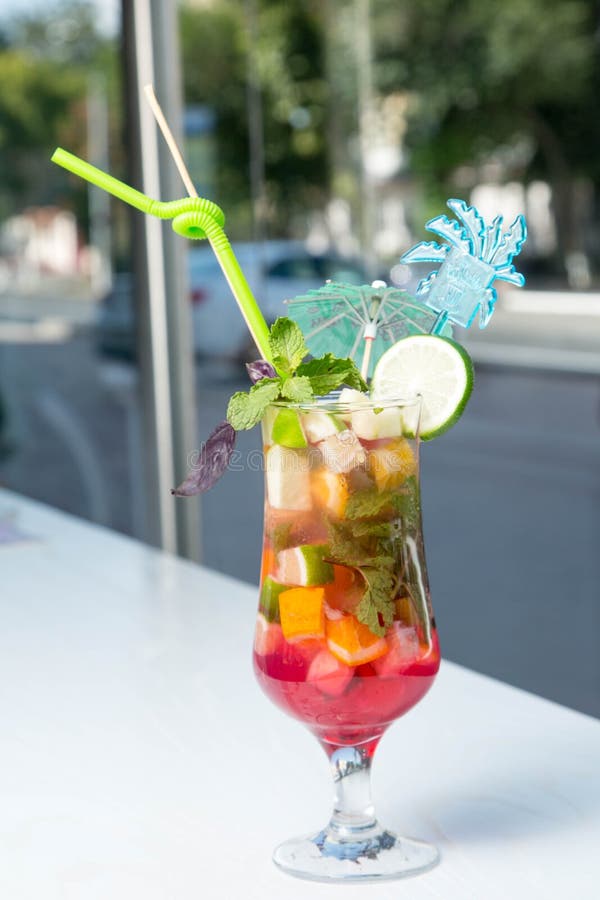 Glass of Red Ice Tea with Mint and Lemon on Isolated White Background ...