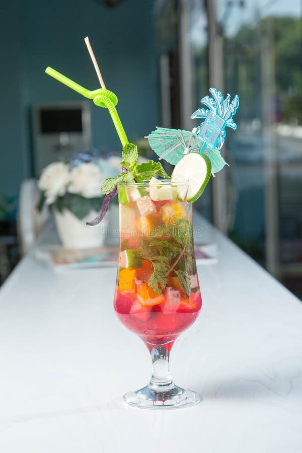 Glass of Red Ice Tea with Mint and Lemon on Isolated White Background ...