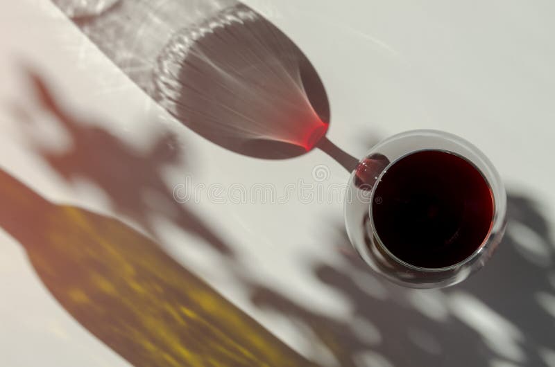 Glass of Red Ruby Port Wine on White Table with Shadows Stock Photo ...