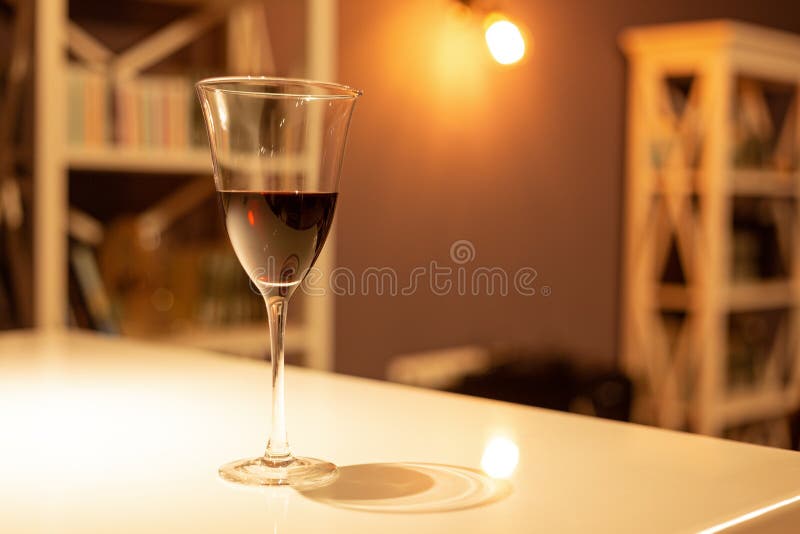 Glass of Red Wine in a Cozy Interior Stock Image - Image of lifestyle ...