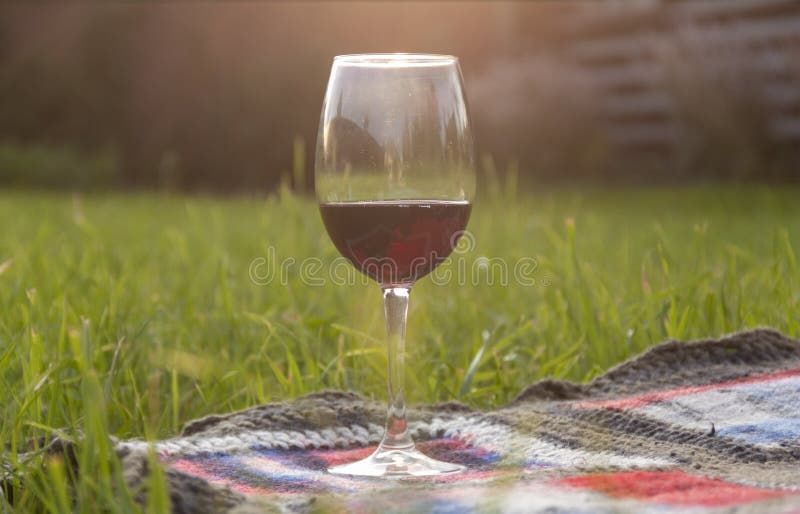 A Glass of Red Wine at Sunset Close-up Stock Photo - Image of backlight ...