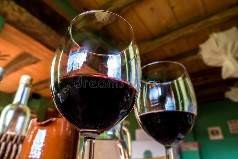 Glass of Red Wine on a Table in Rustic Restaurant Stock Photo - Image ...