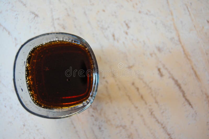 A glass of refreshing coke stock image. Image of home - 110299235
