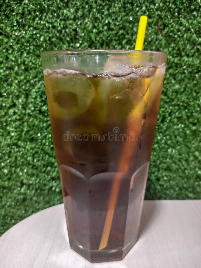 A Glass of Refreshing Sweet Iced Tea on the Table Stock Image - Image ...