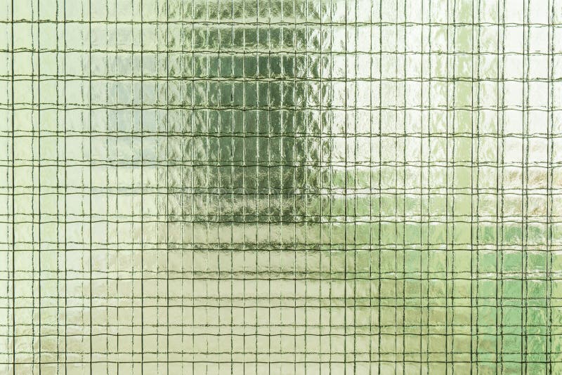 Glass with Reinforcing Mesh, Silhouette of Windows and Doors Behind ...