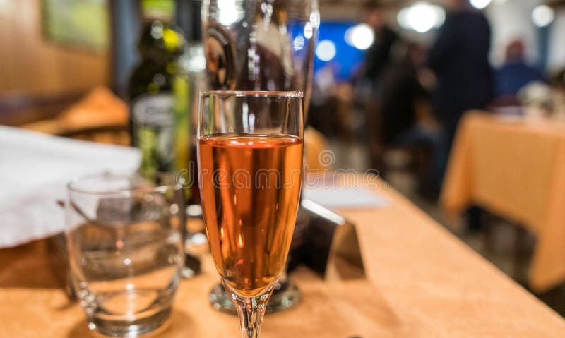 Glass of Rose Wine on the Dining Table in Restaurant Stock Photo ...