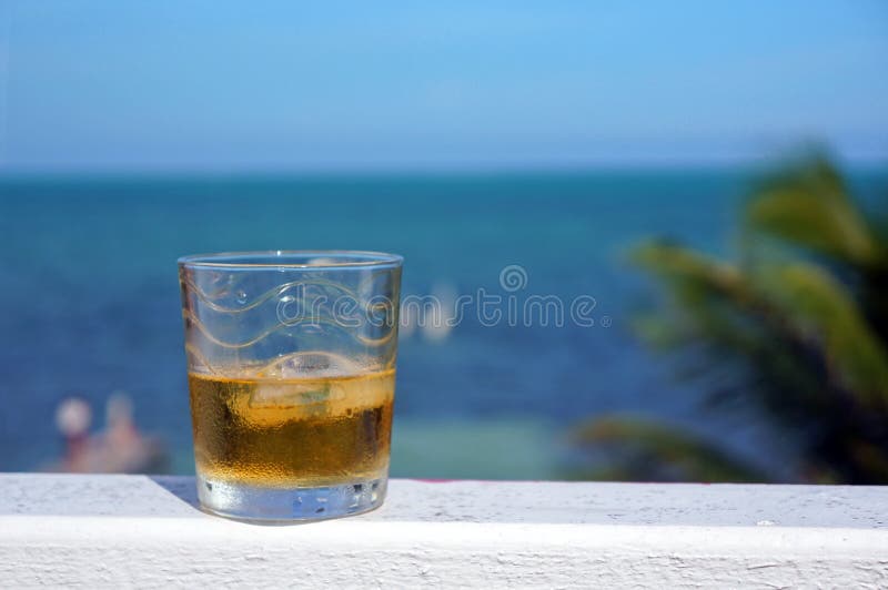 Rum on Rocks Cocktail by the Sea Stock Photo - Image of beach, puerto ...