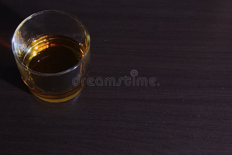 Glass with Rum Isolated on a Dark Wood Table Stock Image - Image of ...