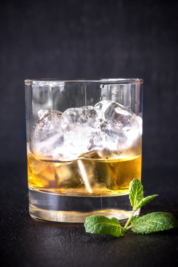 Glass Of Rum On The Dark Background Stock Photo - Image of closeup ...