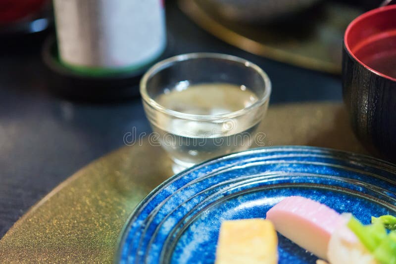 A Glass with Sake on the Table, Tokyo, Japan. Close-up. Stock Photo ...