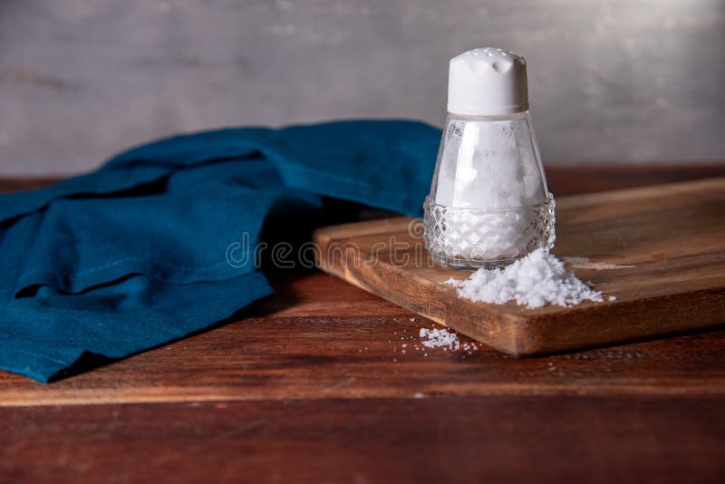Glass Salt Shaker on the Table Stock Photo - Image of gingham, dining ...