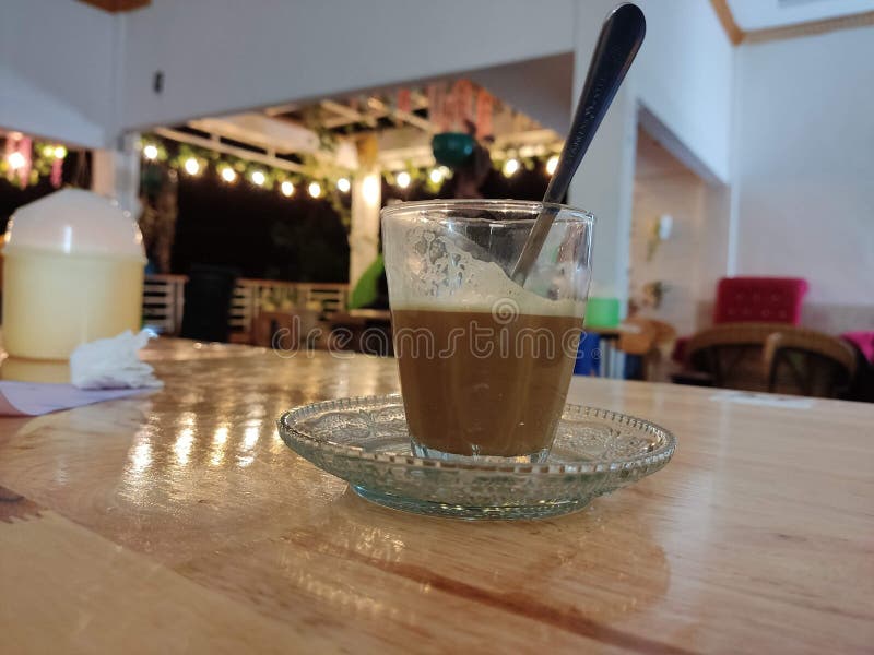 A Glass of Sanger Coffee on the Table Stock Image - Image of sanger ...