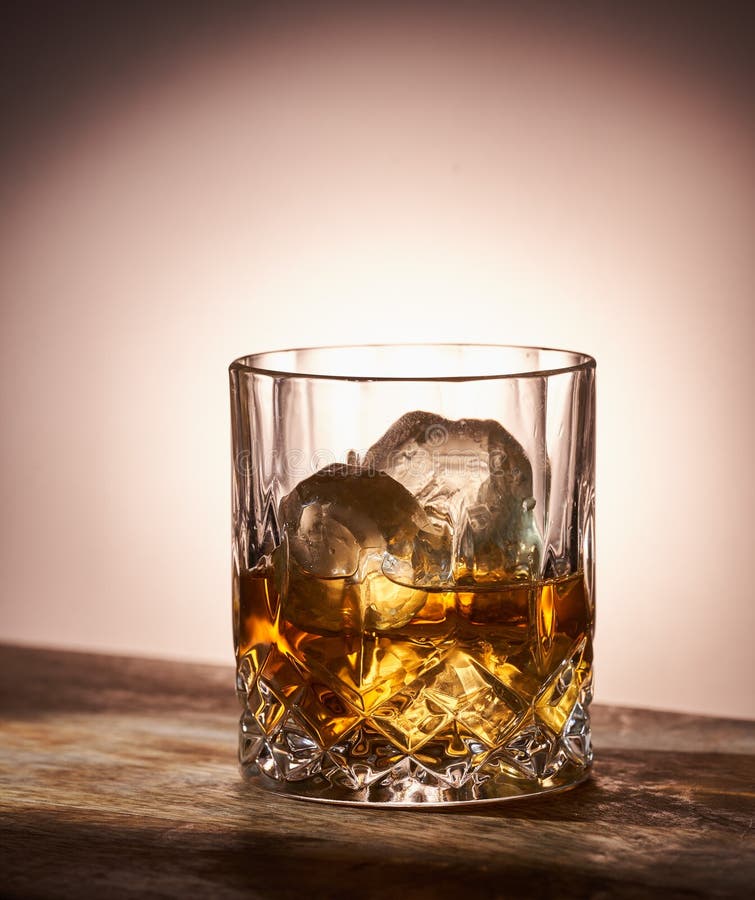 Glass of scotch and ice stock photo. Image of gold, cube - 305596338