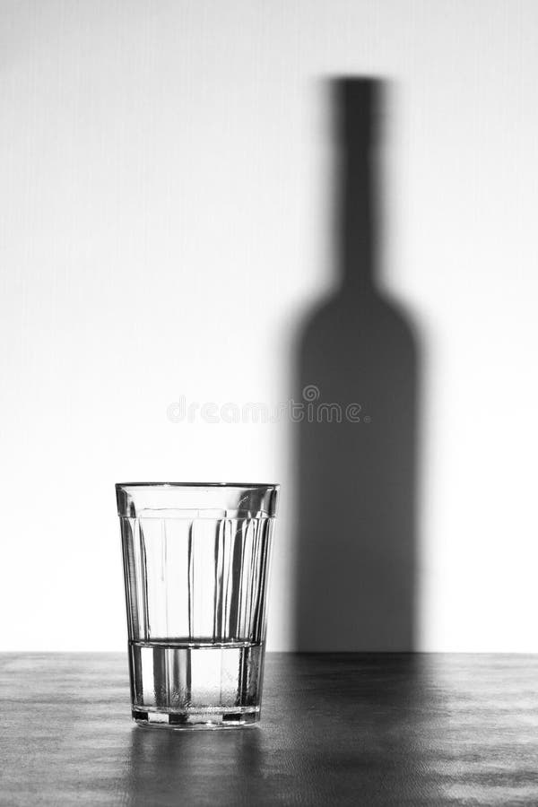 Glass and Shadow from the Bottle Stock Photo - Image of shadow, water ...