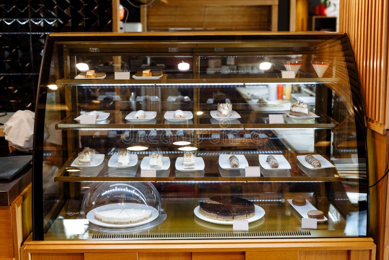 Glass Showcase with a Pastries in the Restaurant Stock Photo - Image of ...