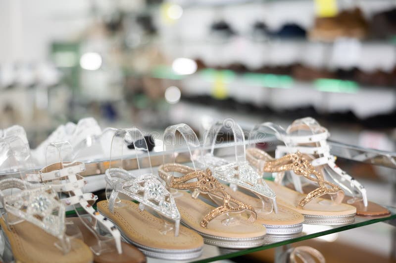 Showcase with Models of Sneakers in Shoe Store Stock Image - Image of ...