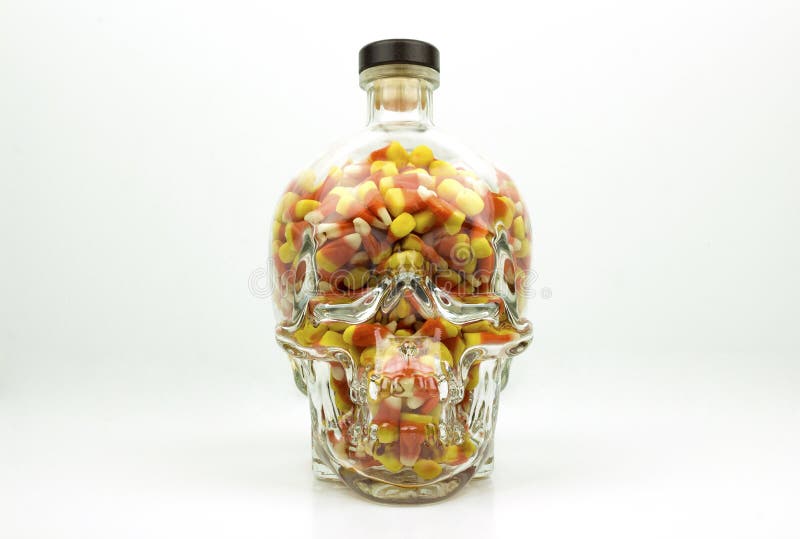 Glass Skull Filled with Candy Corn Isolated Stock Image - Image of ...