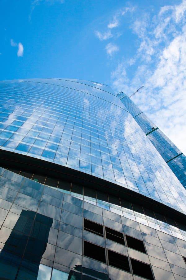Glass skyscraper and sky stock image. Image of perspective - 65929315