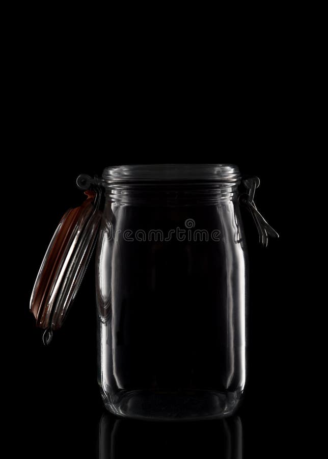 A Glass Storage or Canning Jar Isolated on Black with Reflection, with ...