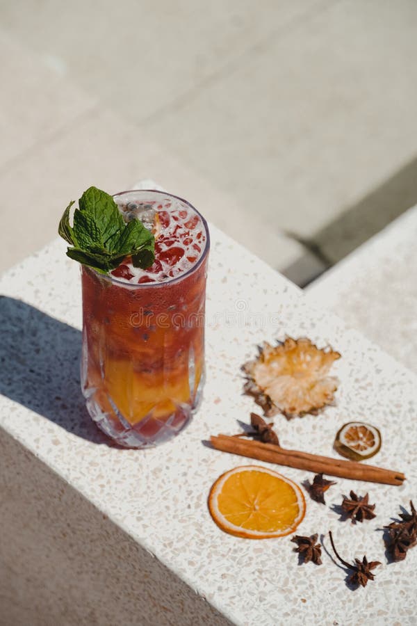 A Glass of Sunset Cocktails Stock Image - Image of drink, sunset: 267185955