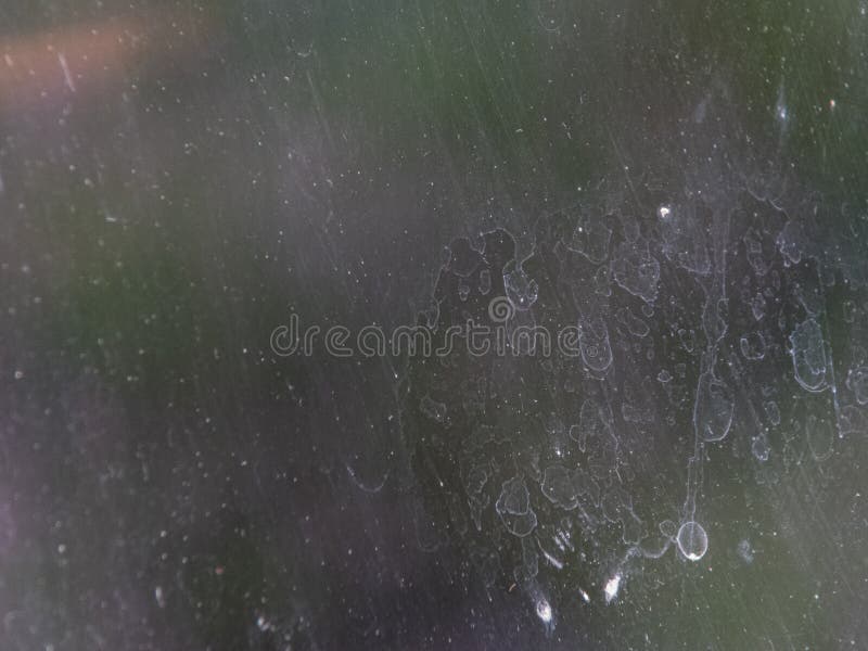 The Glass Surface Displayed Unsightly Water Stains,marring Its Once ...